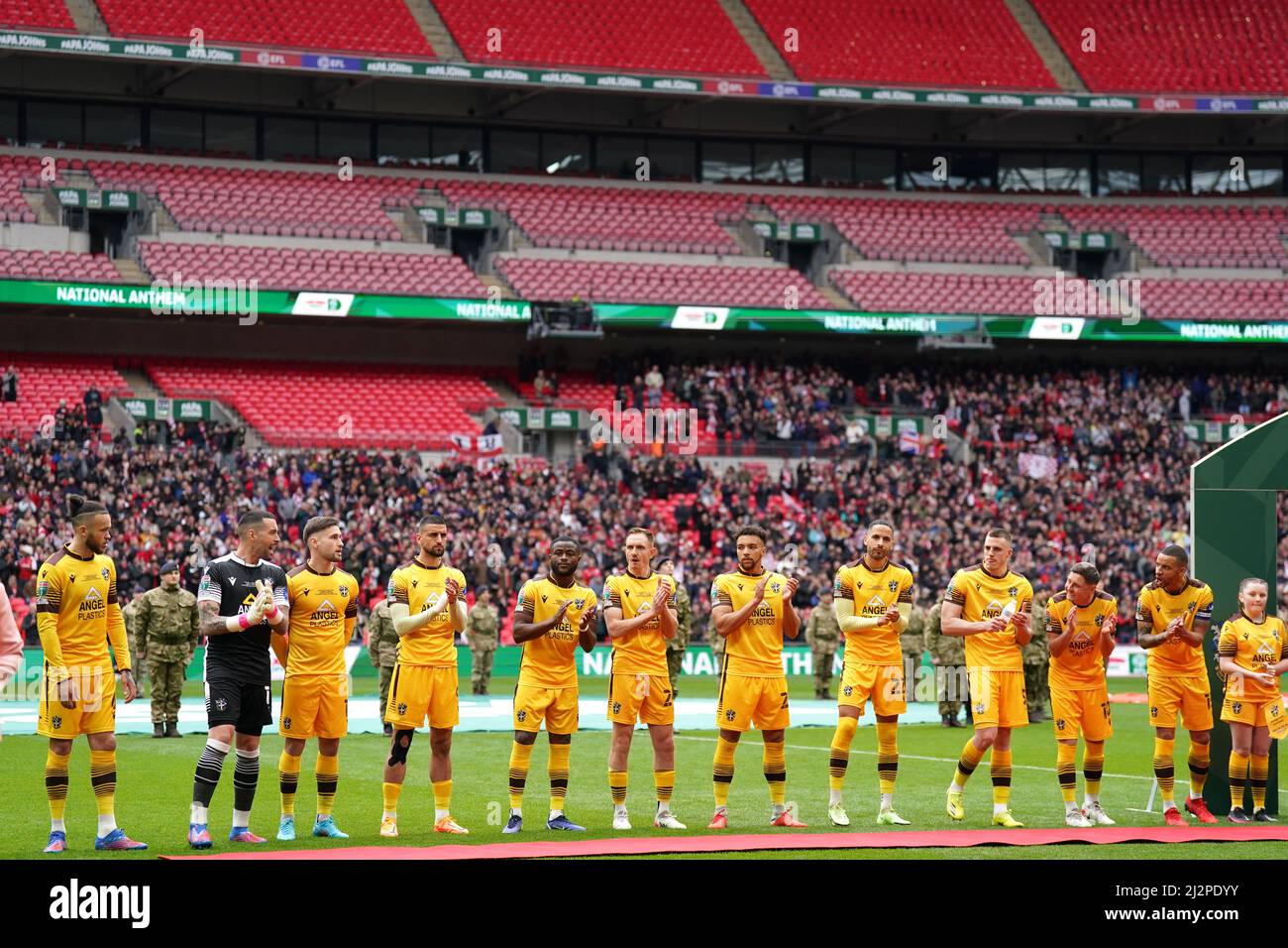 Sutton United players line up before the Papa John's Trophy final at ...