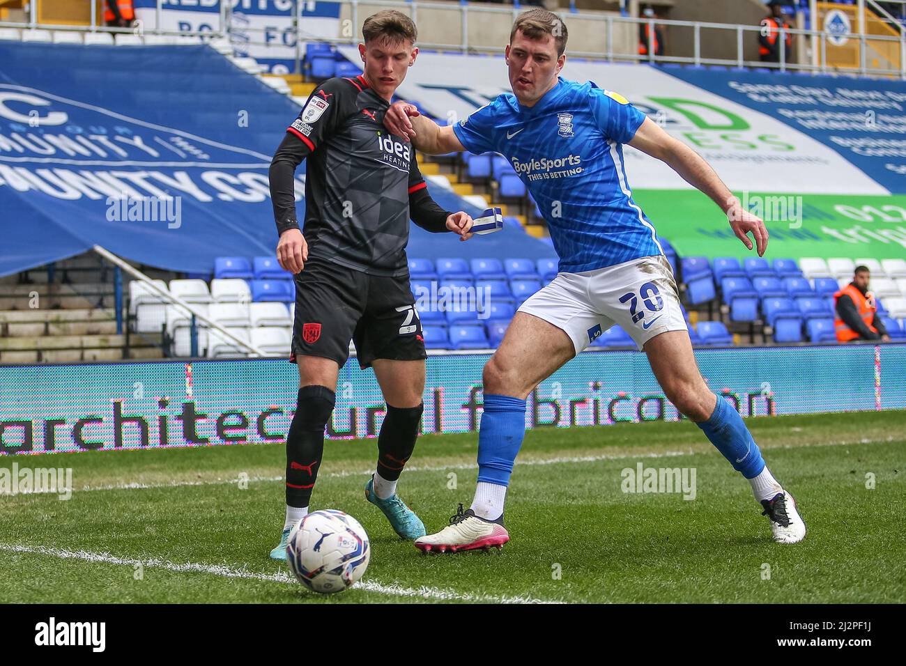 Gary Gardner #20 of Birmingham City holds of Taylor Gardner-Hickman #29 ...