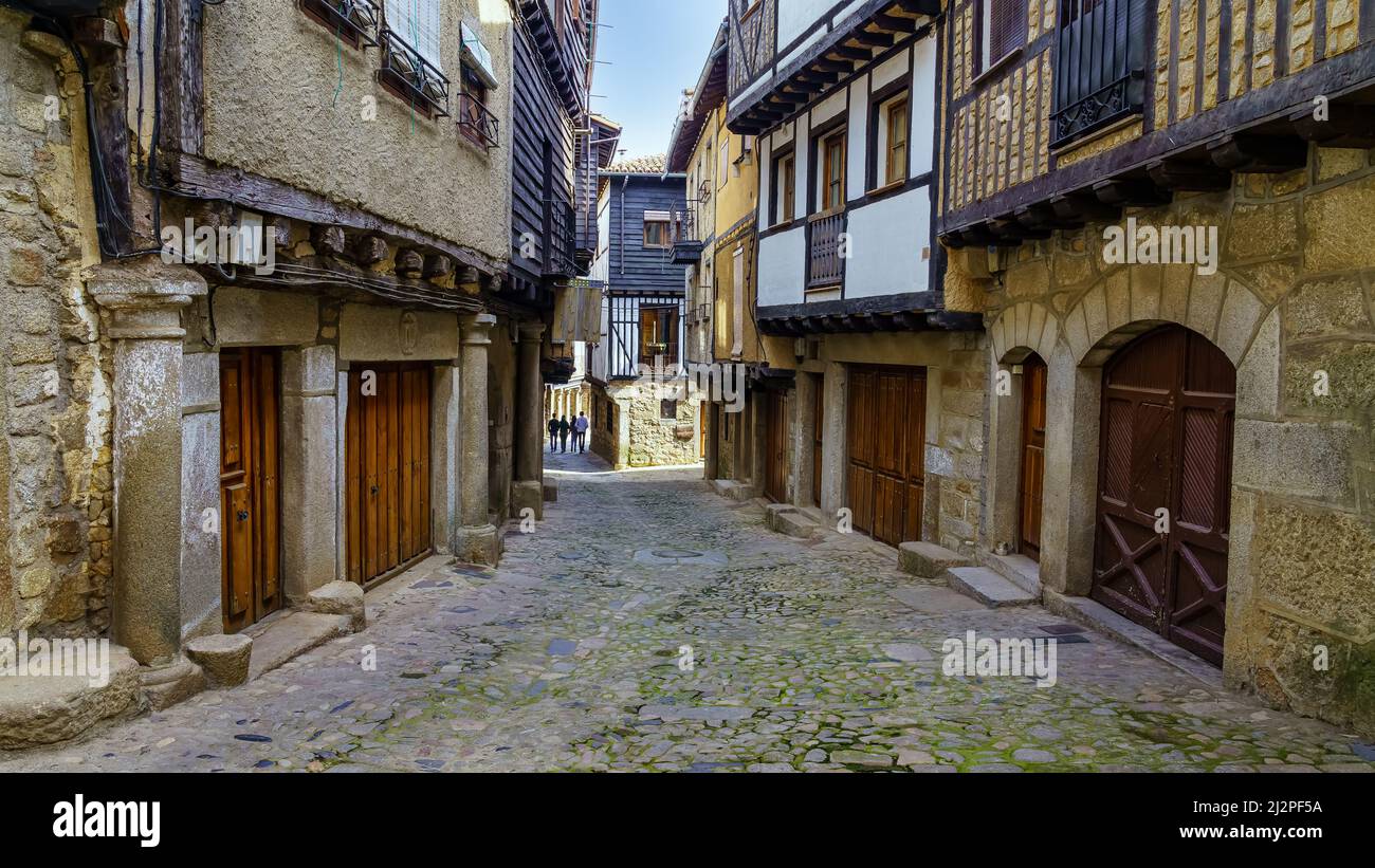 Medieval alley with typical houses of the mountain of Salamanca, La ...
