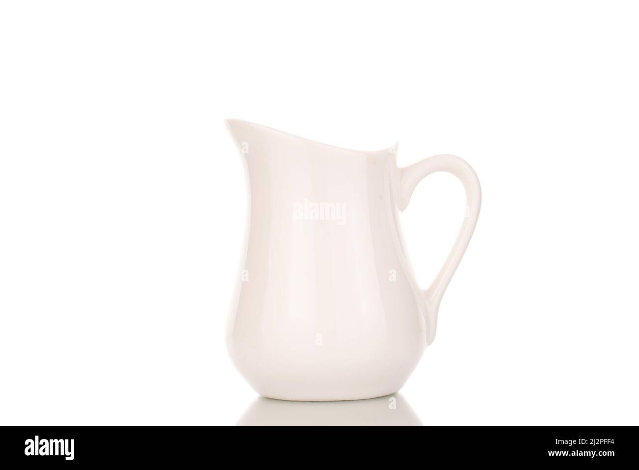 One ceramic milk jug, close-up, isolated on a white background Stock ...