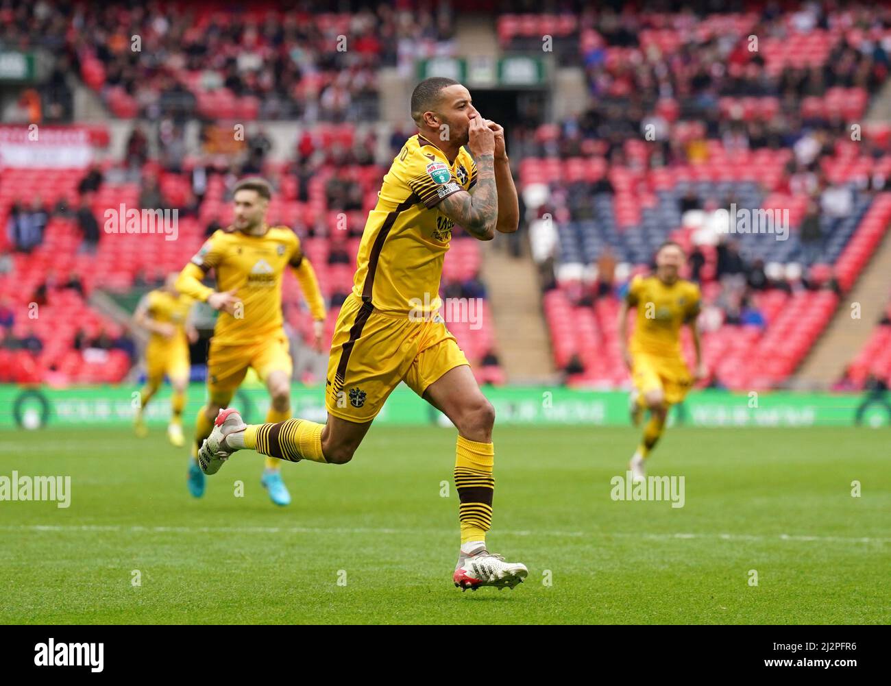 Sutton United's Craig Eastmond (centre) celebrates scoring their side's ...