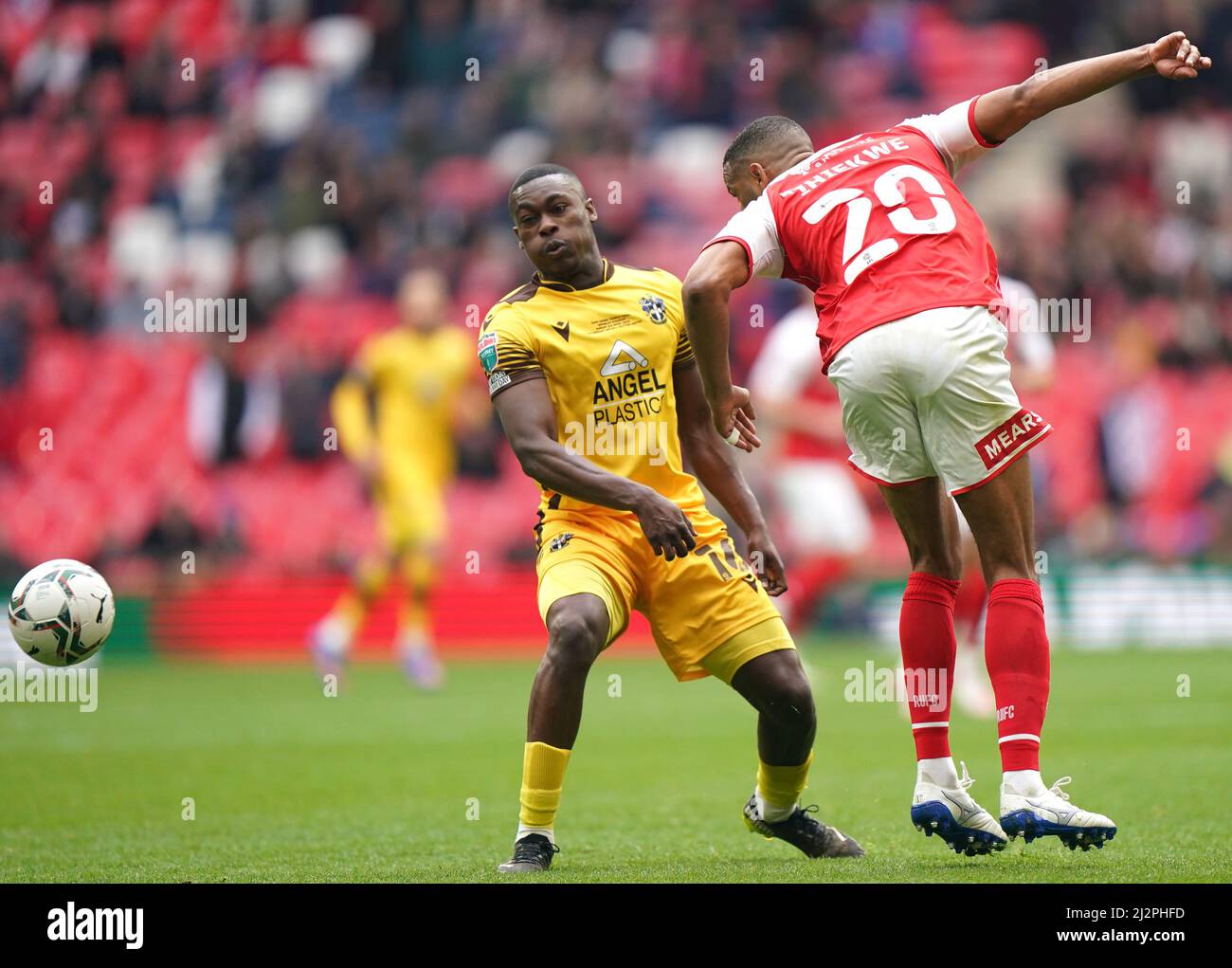 Sutton United's Isaac Olaofe (left)and Rotherham United's Michael ...