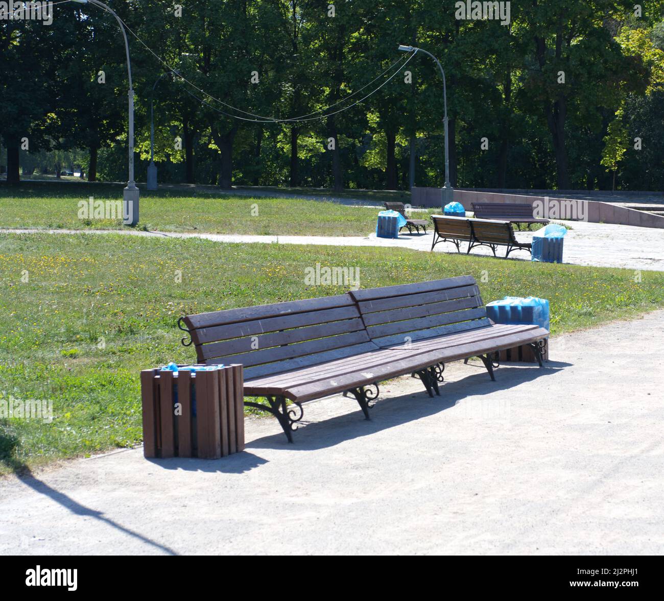 bench in park at dry sunny summer day Stock Photo - Alamy