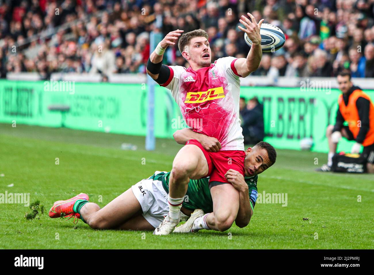 Harlequins' Luke Northmore is tackled by London Irish's Will Joseph ...