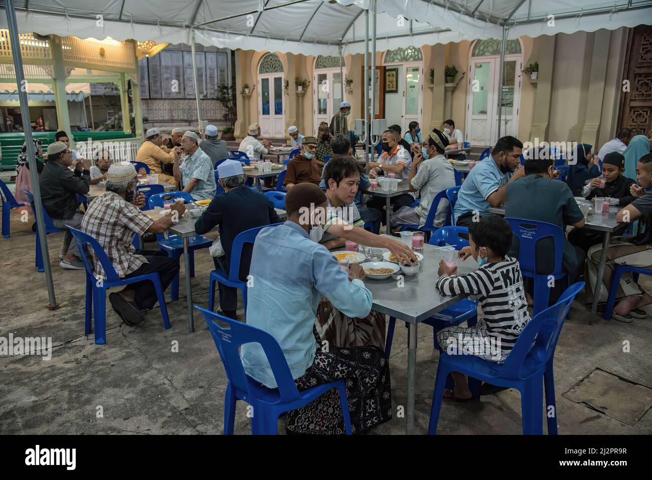 Bangkok, Thailand. 03rd Apr, 2022. Muslims seen having an evening meal ...