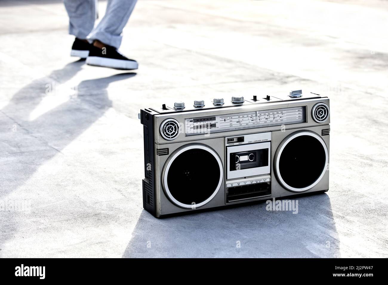 The sound of music. High angle shot of a boombox on the floor with an ...