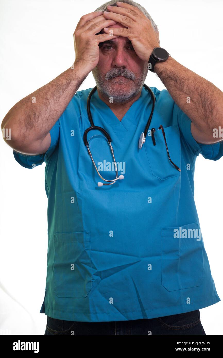 doctor with his hands on his head, bad news, exhaustion, stress Stock ...