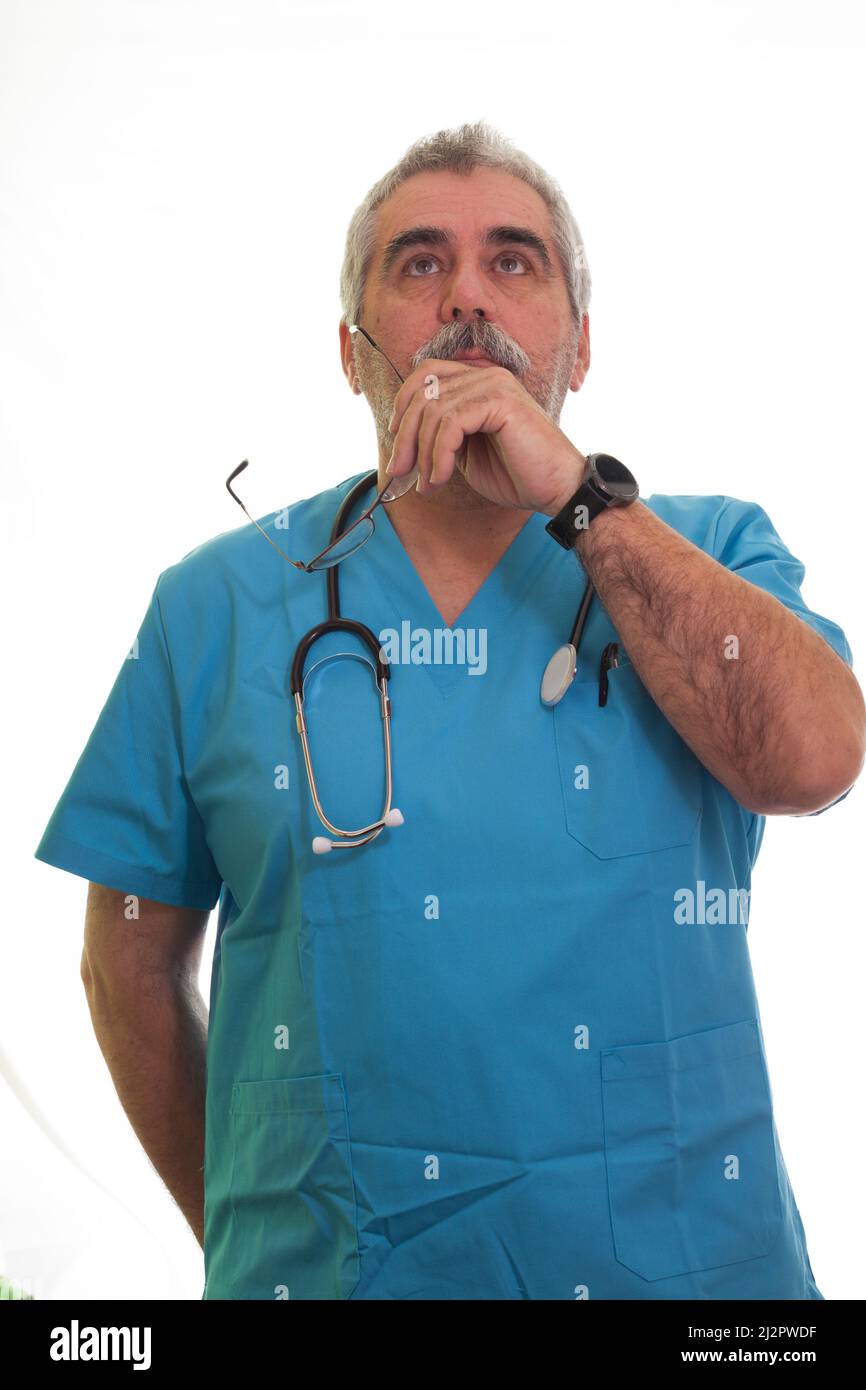 Senior Physician Looking Up In A Pensive Mood Annual Medical Checkup