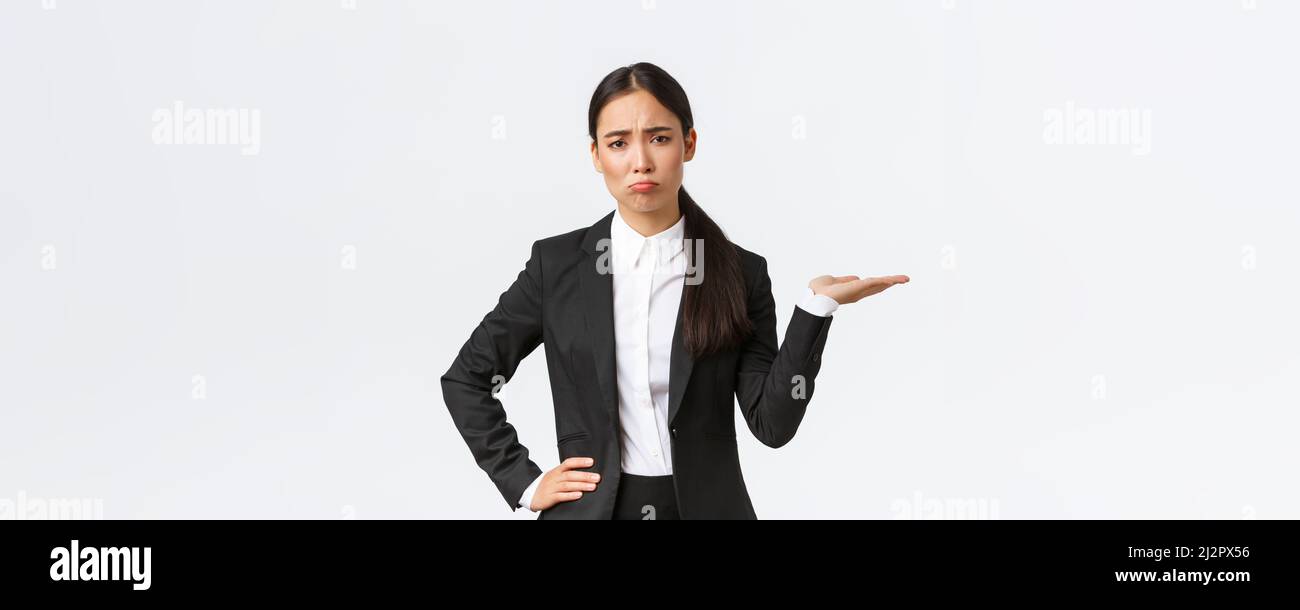 Disappointed and gloomy female sales manager, real estate agent in ...