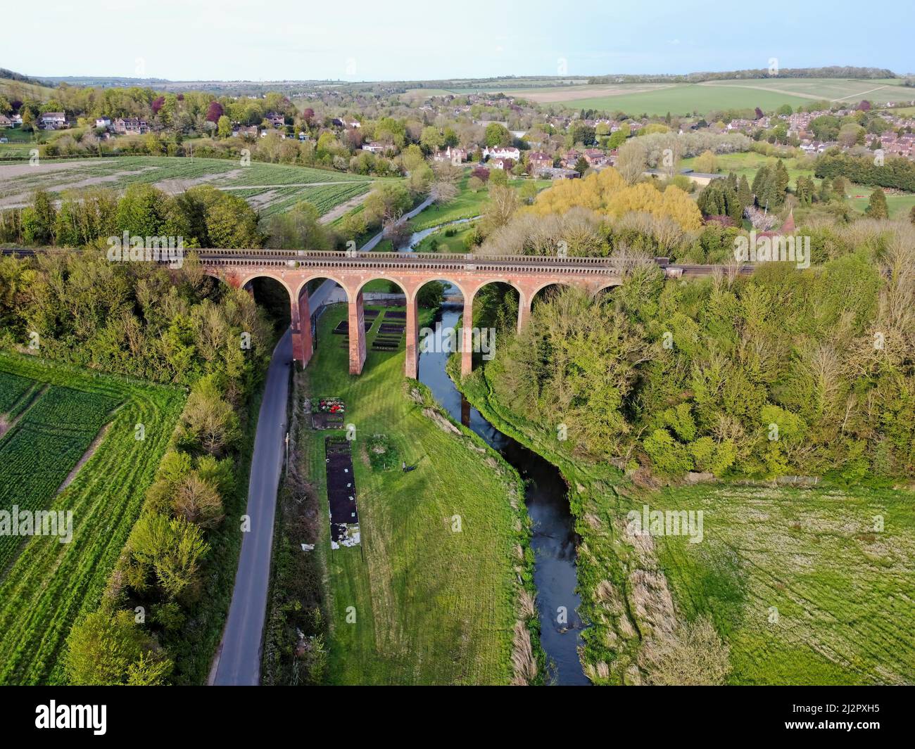 Aerial drone view of Eynsford viaduct, arched brick bridge for railway ...