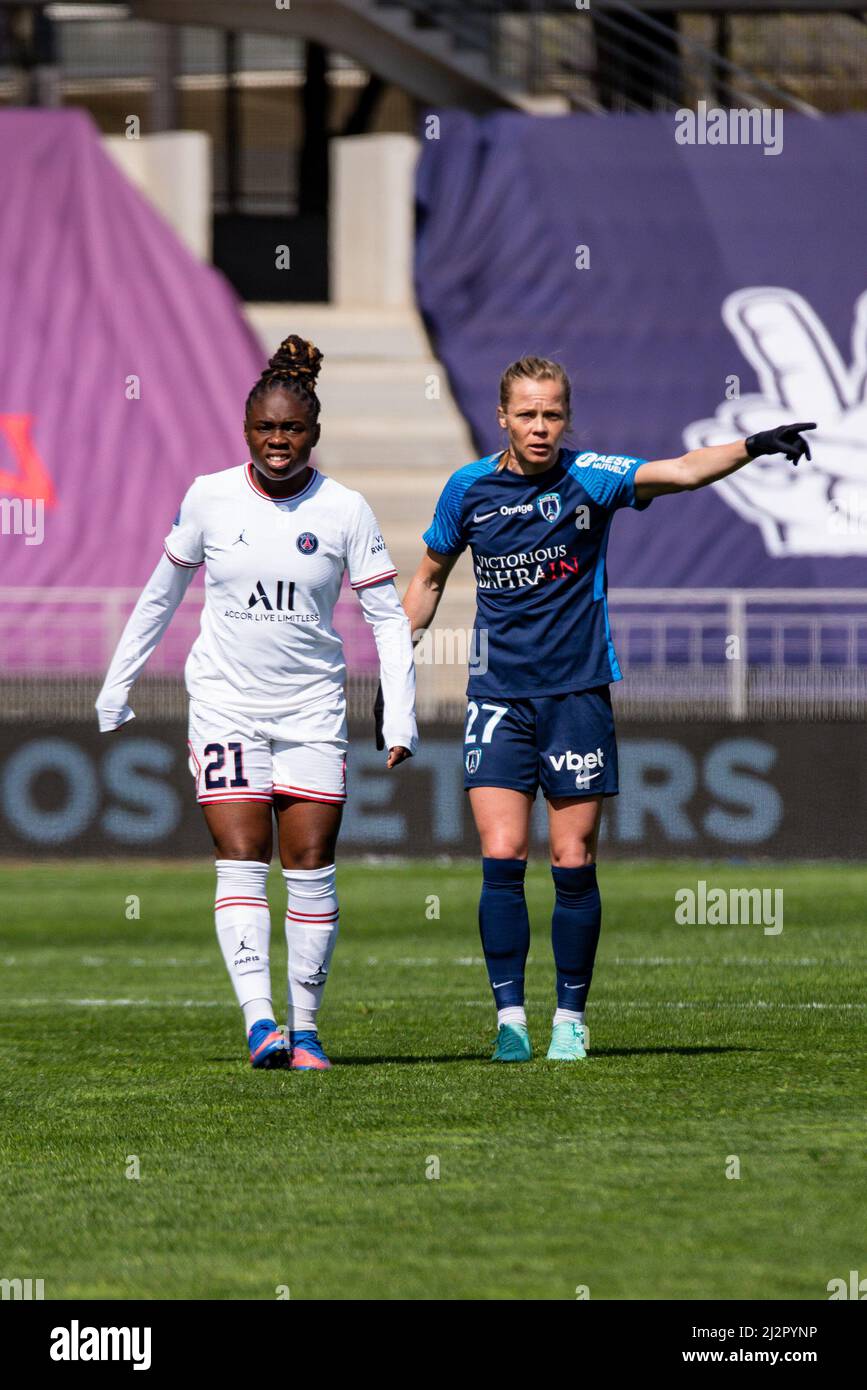 Sandy Baltimore of Paris Saint Germain and Julie Soyer of Paris FC ...