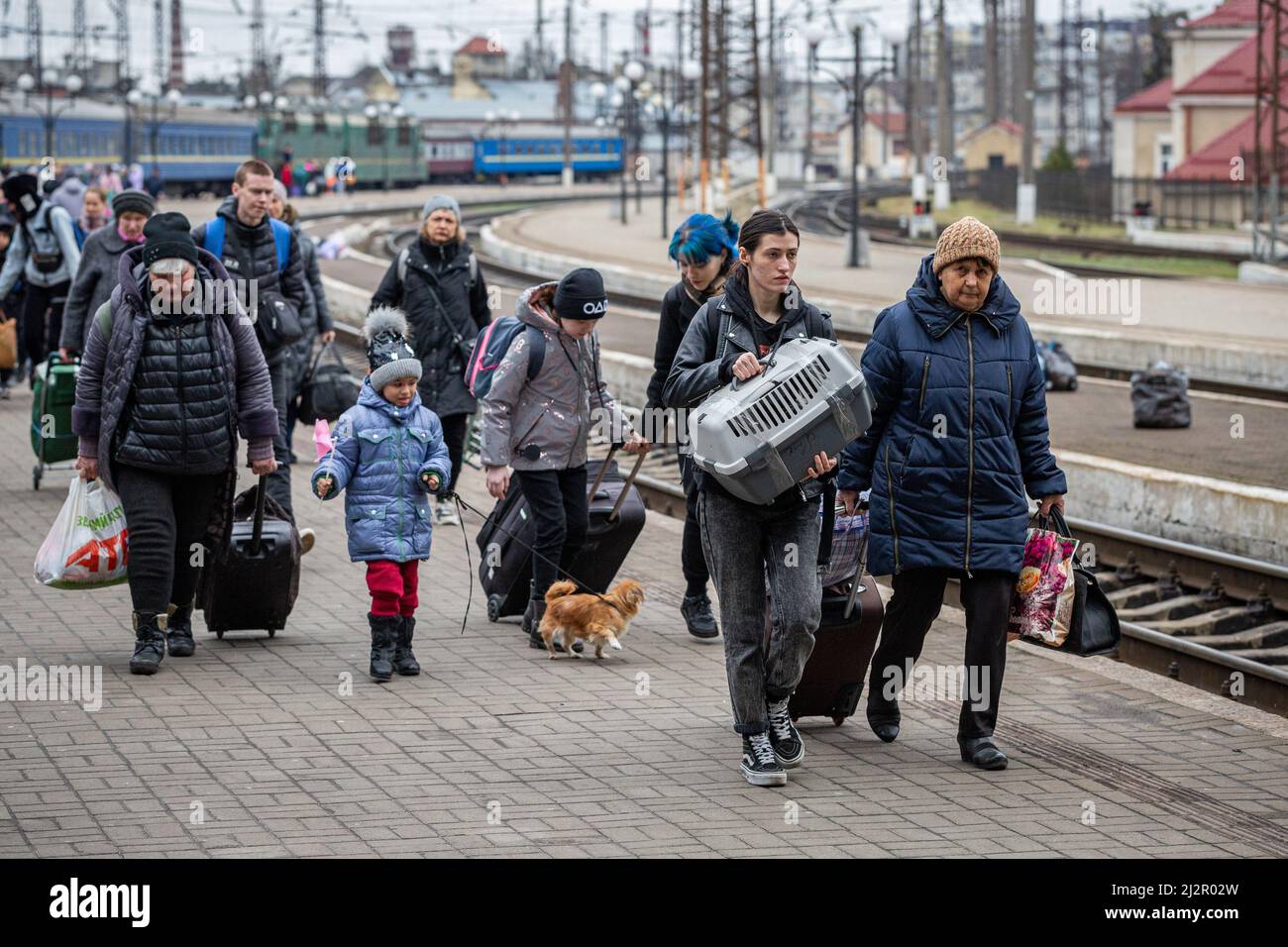 LVIV, UKRAINE - APR 02, 2022: War in Ukraine. Refugees women, children ...