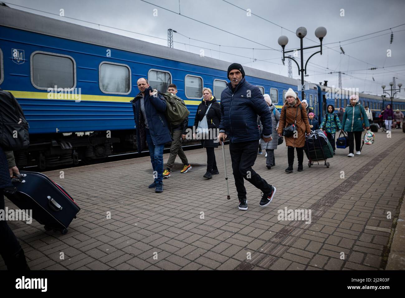 LVIV, UKRAINE - APR 02, 2022: War in Ukraine. Refugees women, children ...