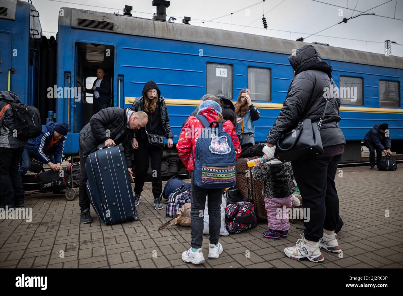 LVIV, UKRAINE - APR 02, 2022: War in Ukraine. Refugees women, children ...