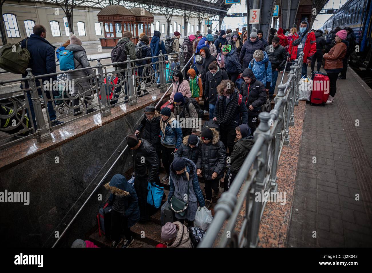 LVIV, UKRAINE - APR 02, 2022: War in Ukraine. Refugees women, children ...