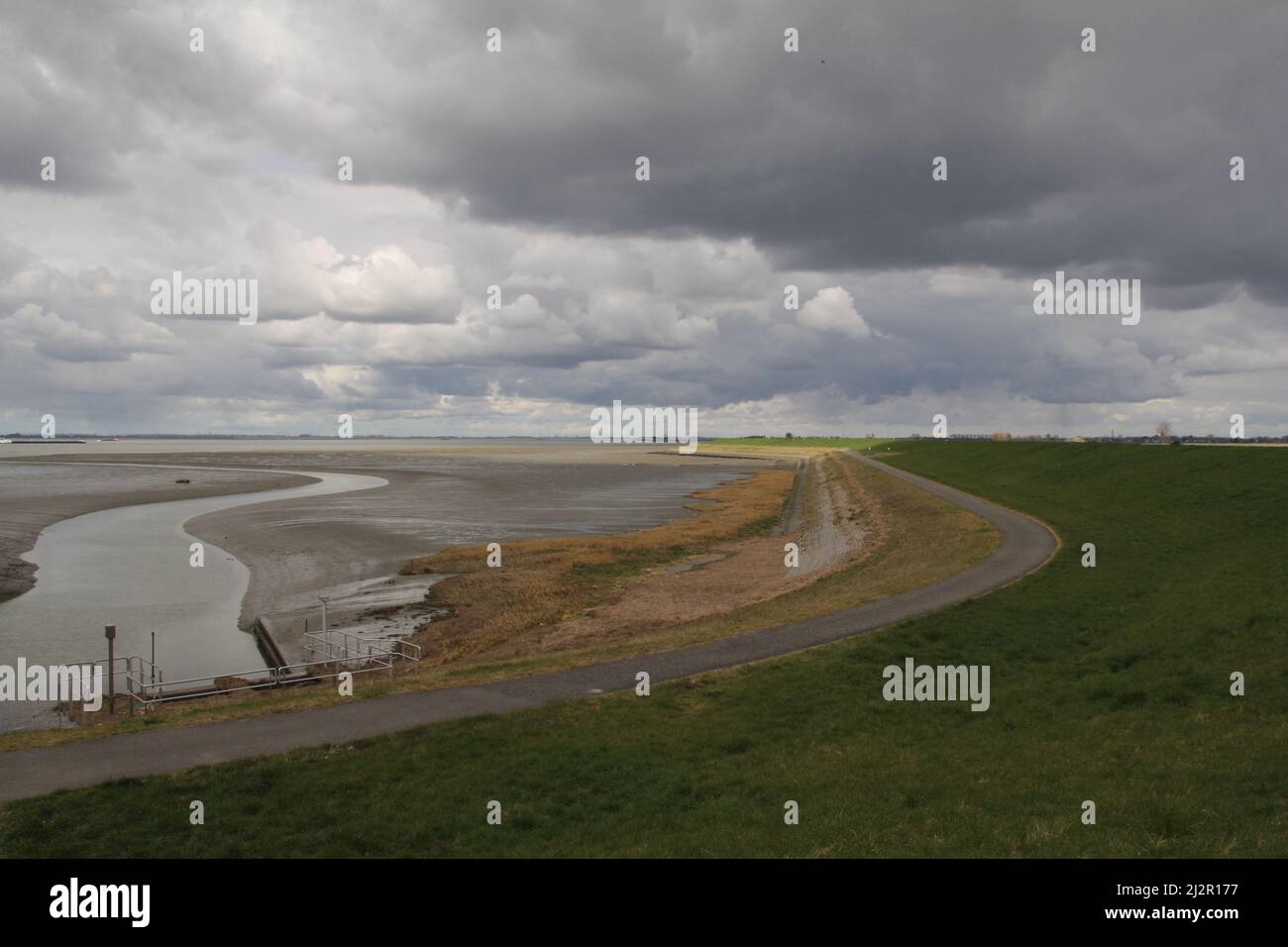 a beautiful dutch coast landscape in zeeland with a colourful salt ...