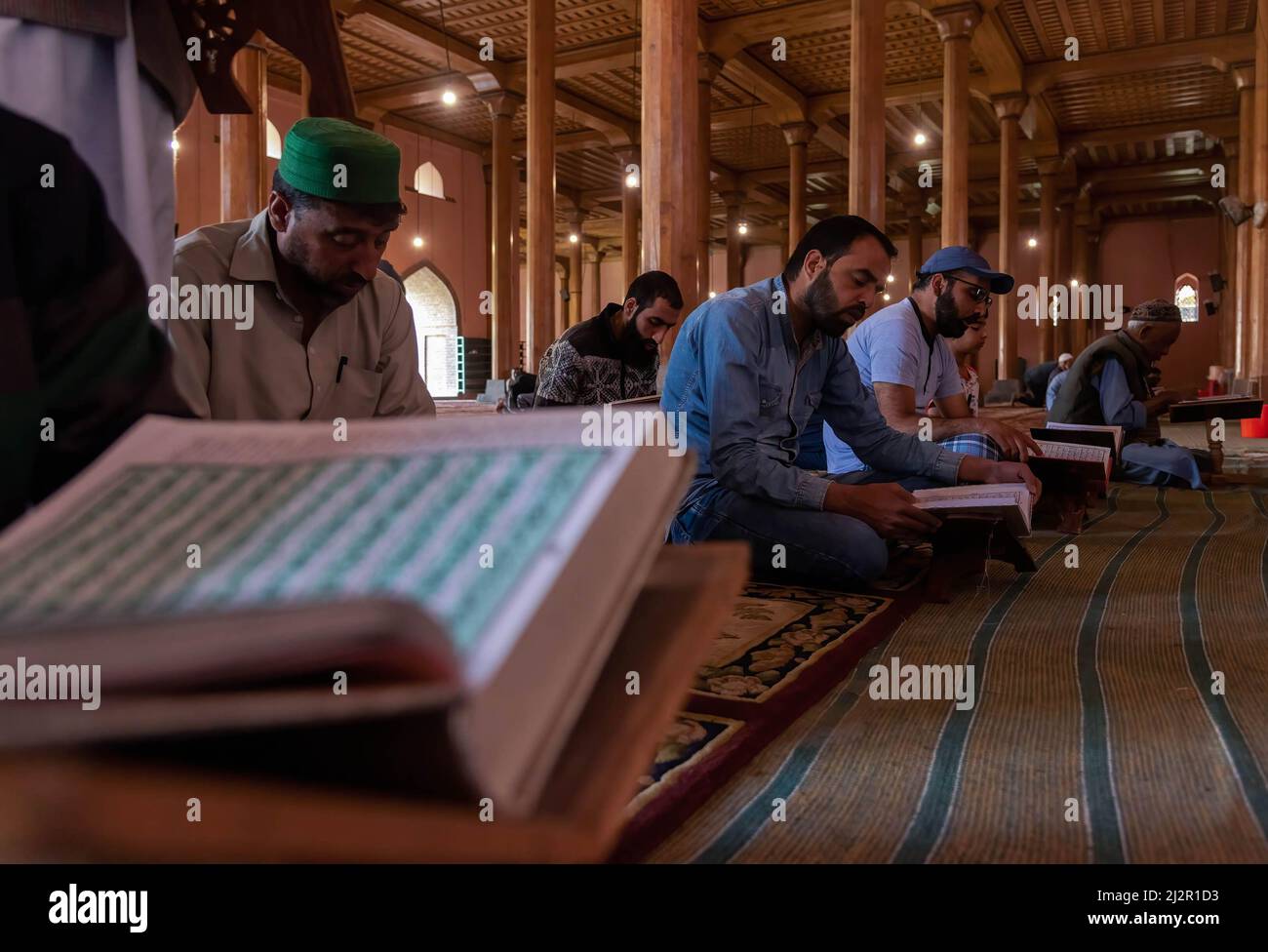 Kashmiri Muslims read Islamic holy book Quran inside Jamia Masjid on ...