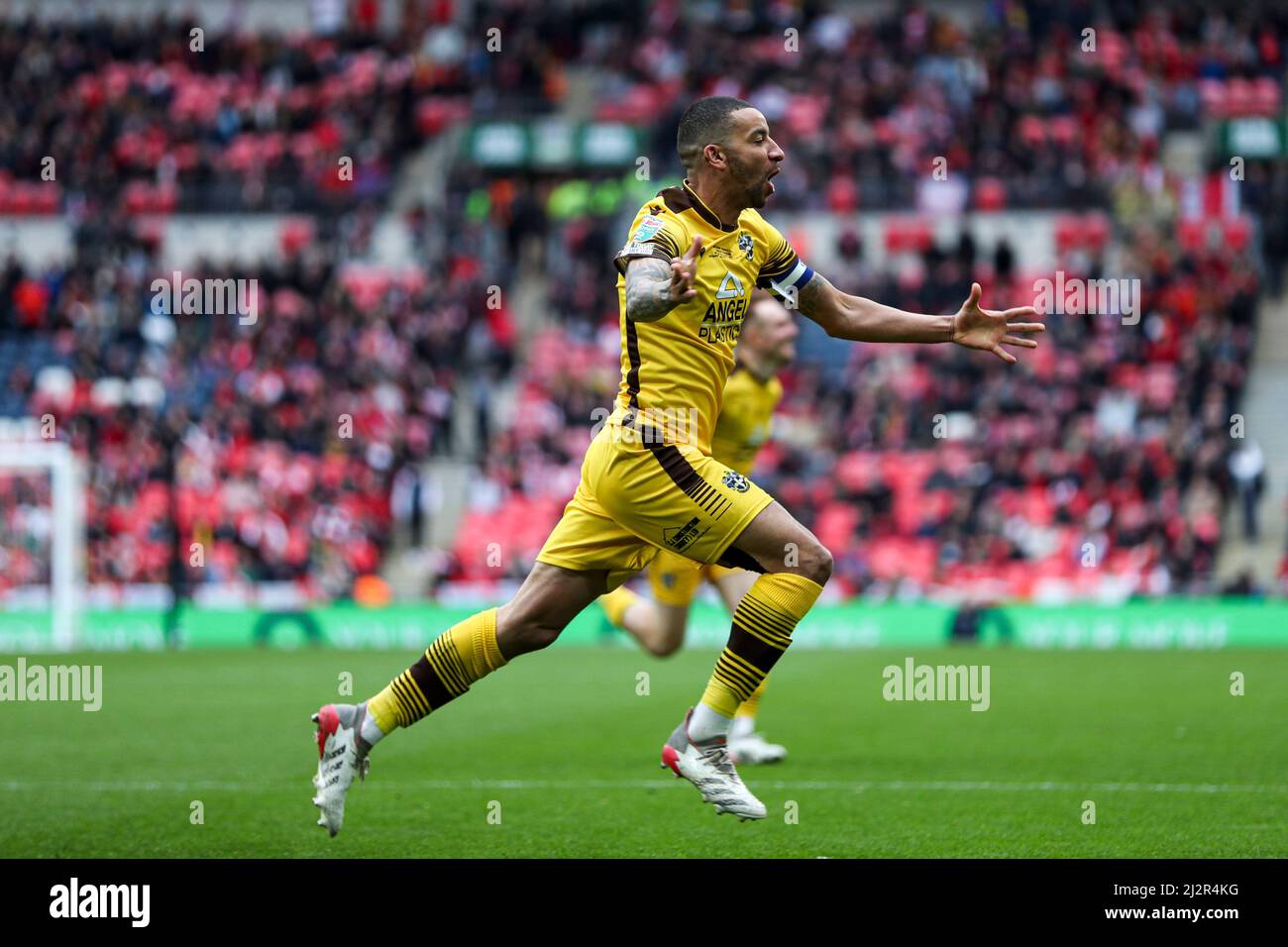 LONDON, UK. APR 3RD Craig Eastmond of Sutton United celebrates his goal ...