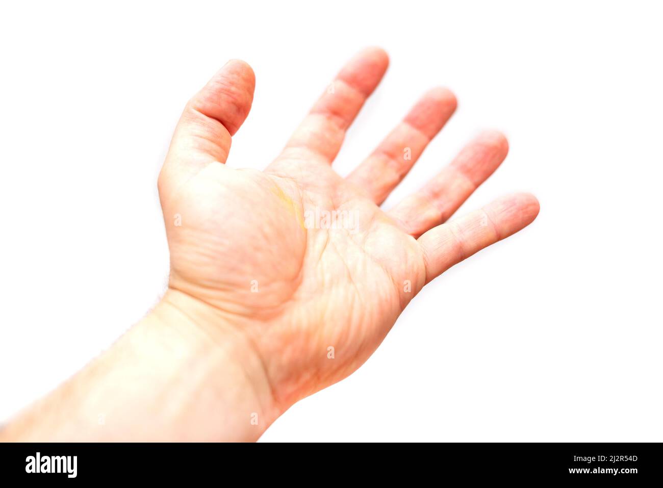 Outstretched male palm on a white background. Isolated Stock Photo - Alamy