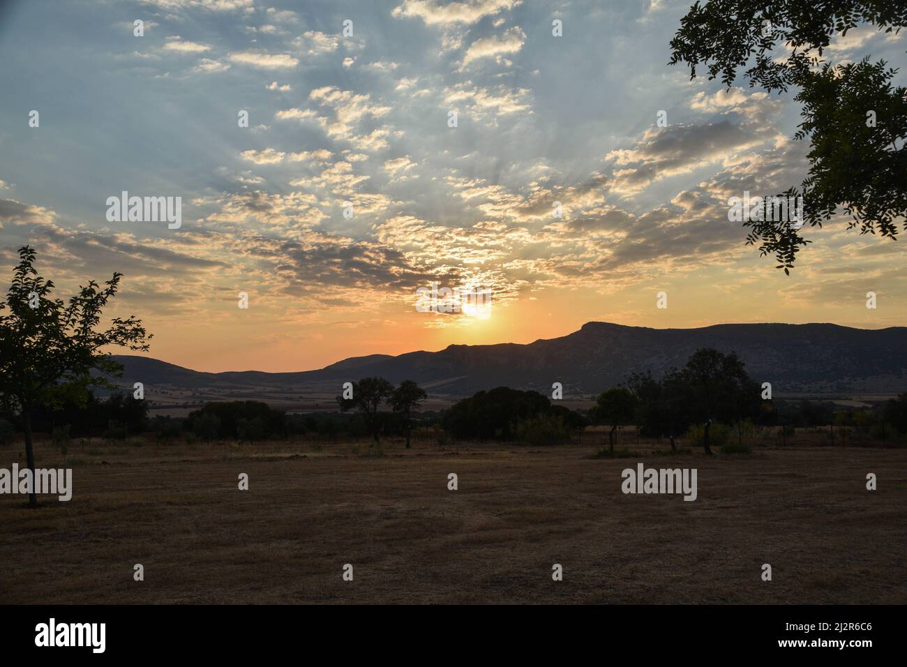 sunset in the plain of La Mancha Stock Photo - Alamy