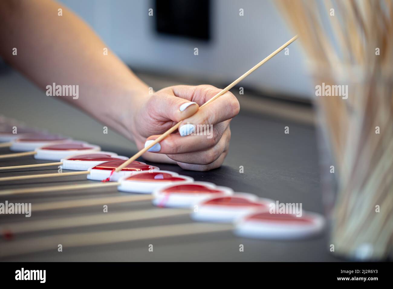 Close-up, the process of making lollipops from natural ingredients ...
