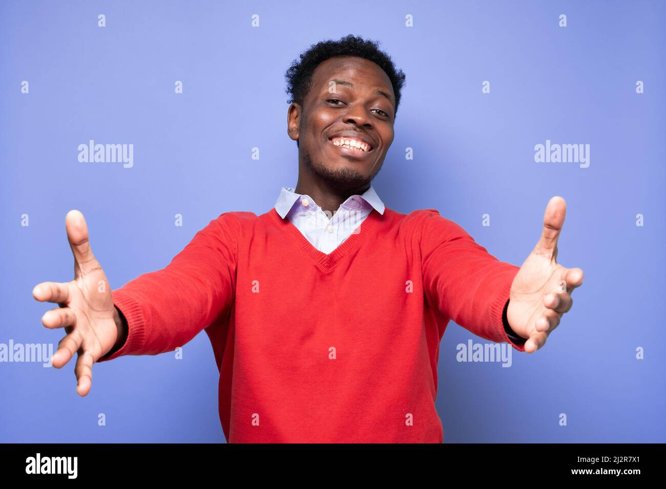 Free hugs for person who had bad day. Cheerfull african man wanting to ...