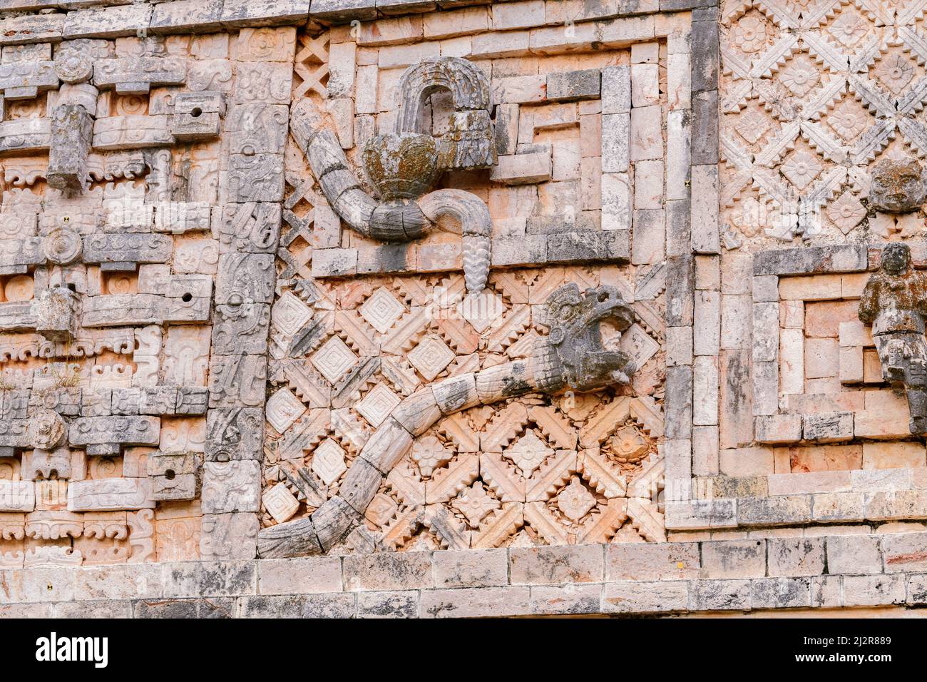 Mayan wall carvings on the Nunnery Quadrangle ruins in Uxmal, Yucatan ...