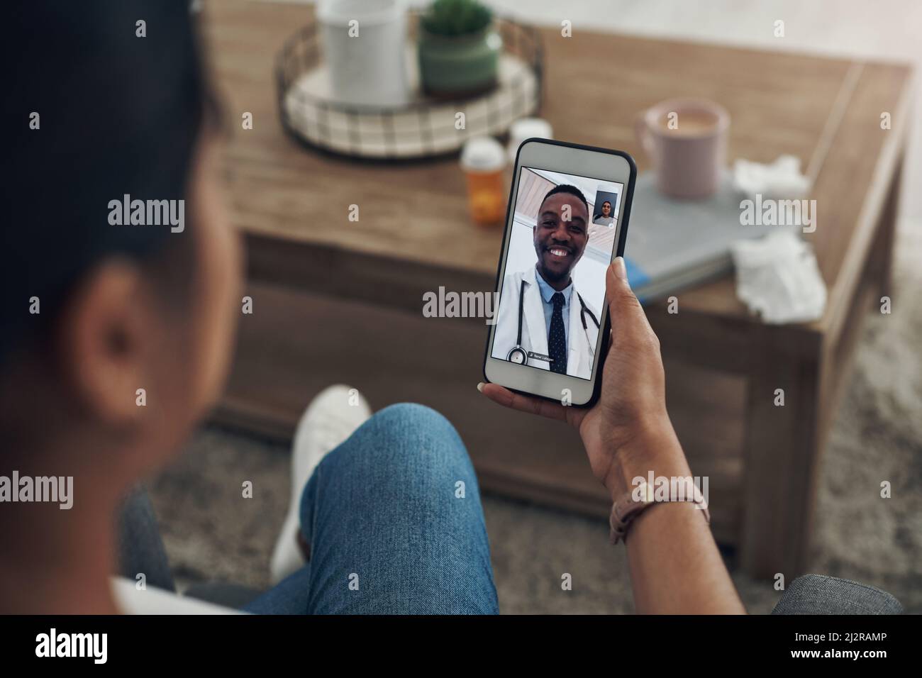 Doctors are available at the tap of a finger. Shot of an unrecognizable ...