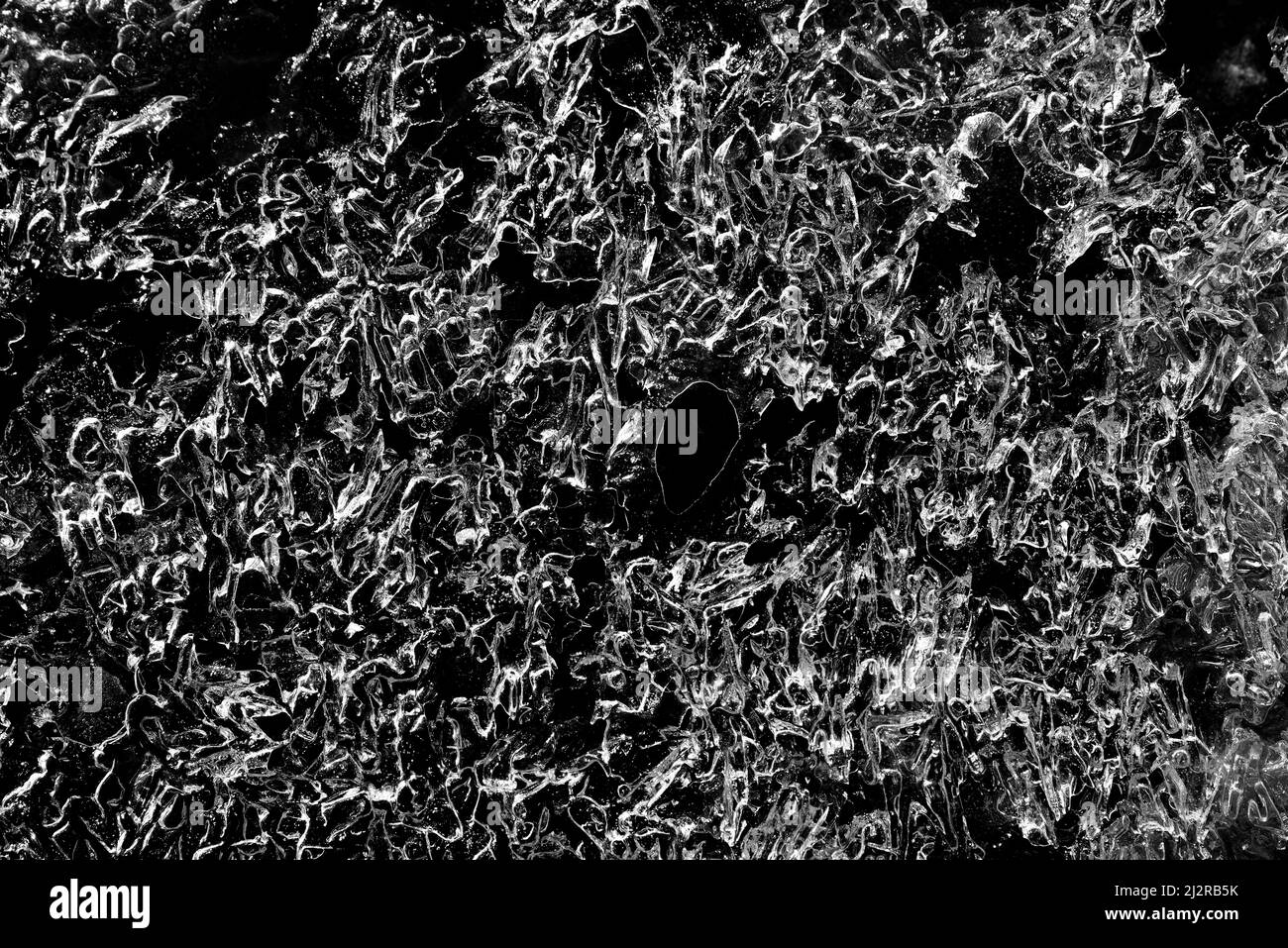 Closeup of black ice texture Stock Photo - Alamy