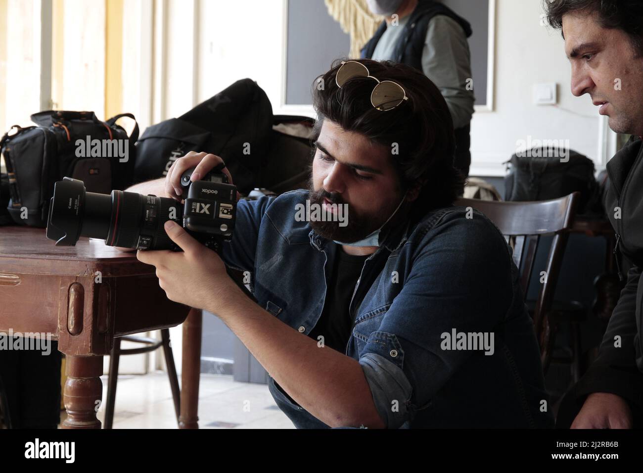Photographers with scarves hi-res stock photography and images - Alamy