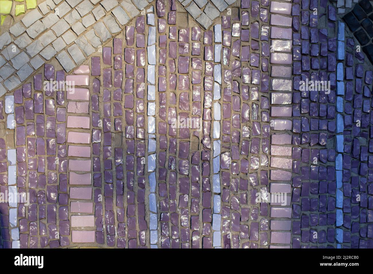 Mosaic texture. Wall is made of pieces of glass. Colored stone ...