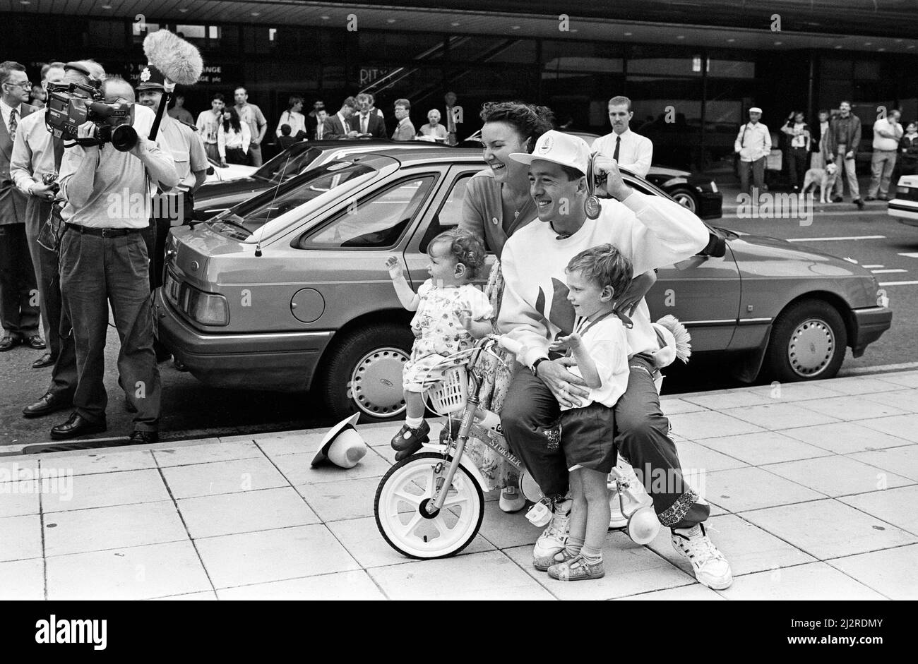British cyclist Chris Boardman poses with his family on arrival at ...