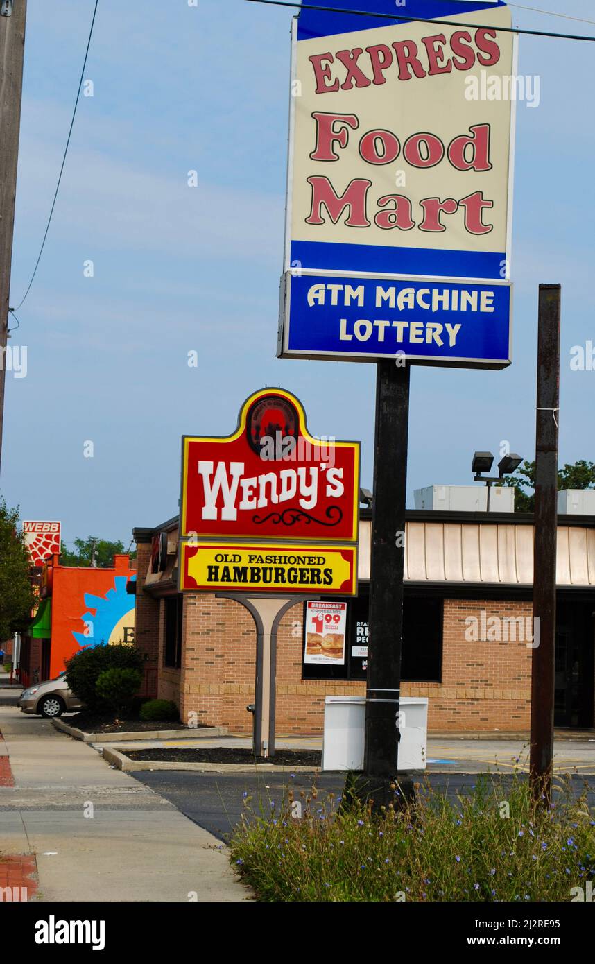 Food Mart and Wendy's signs on 117th street in Lakewood, Ohio Stock ...