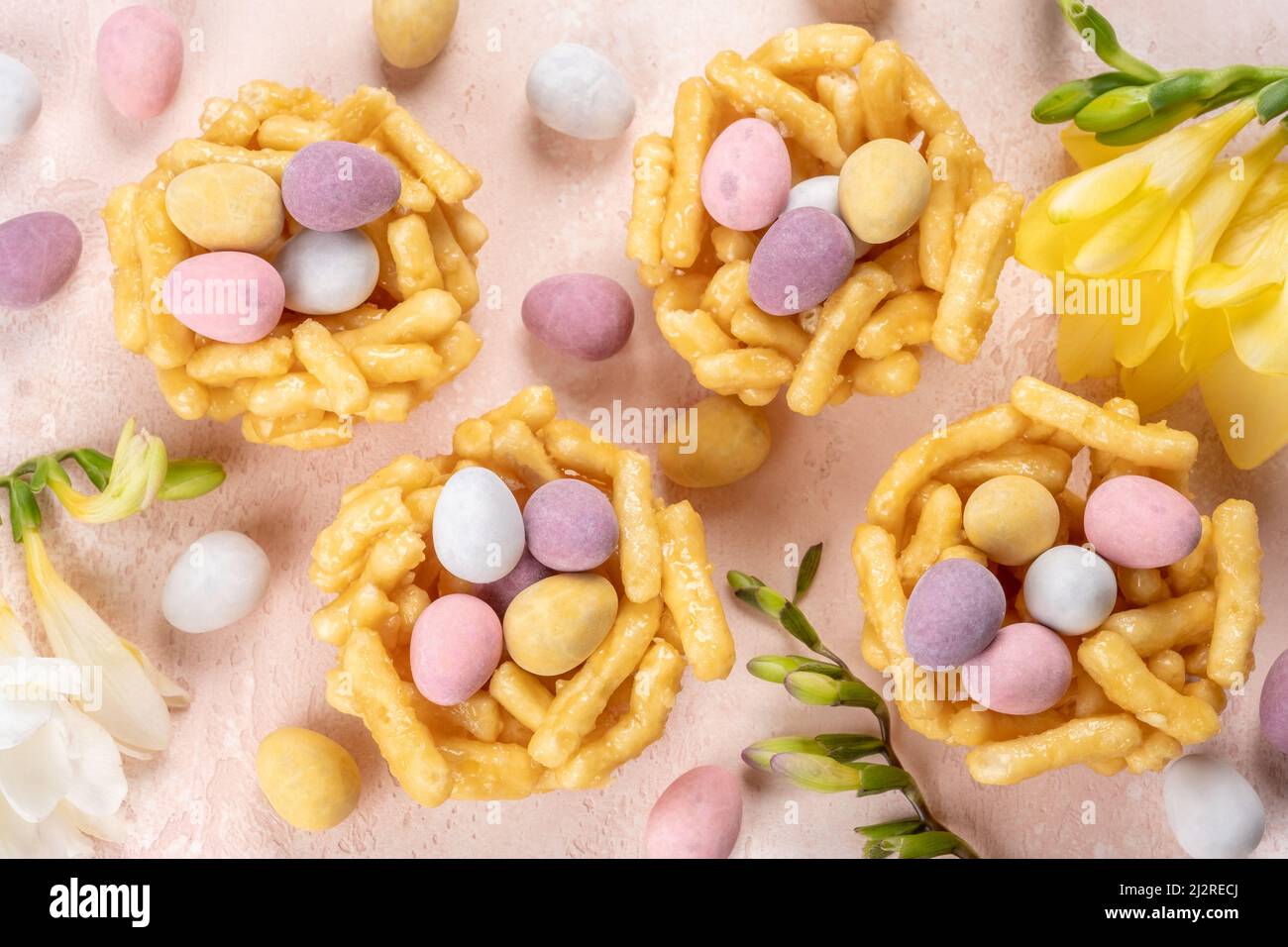 Springtime sweet nests filled with Easter eggs Stock Photo - Alamy