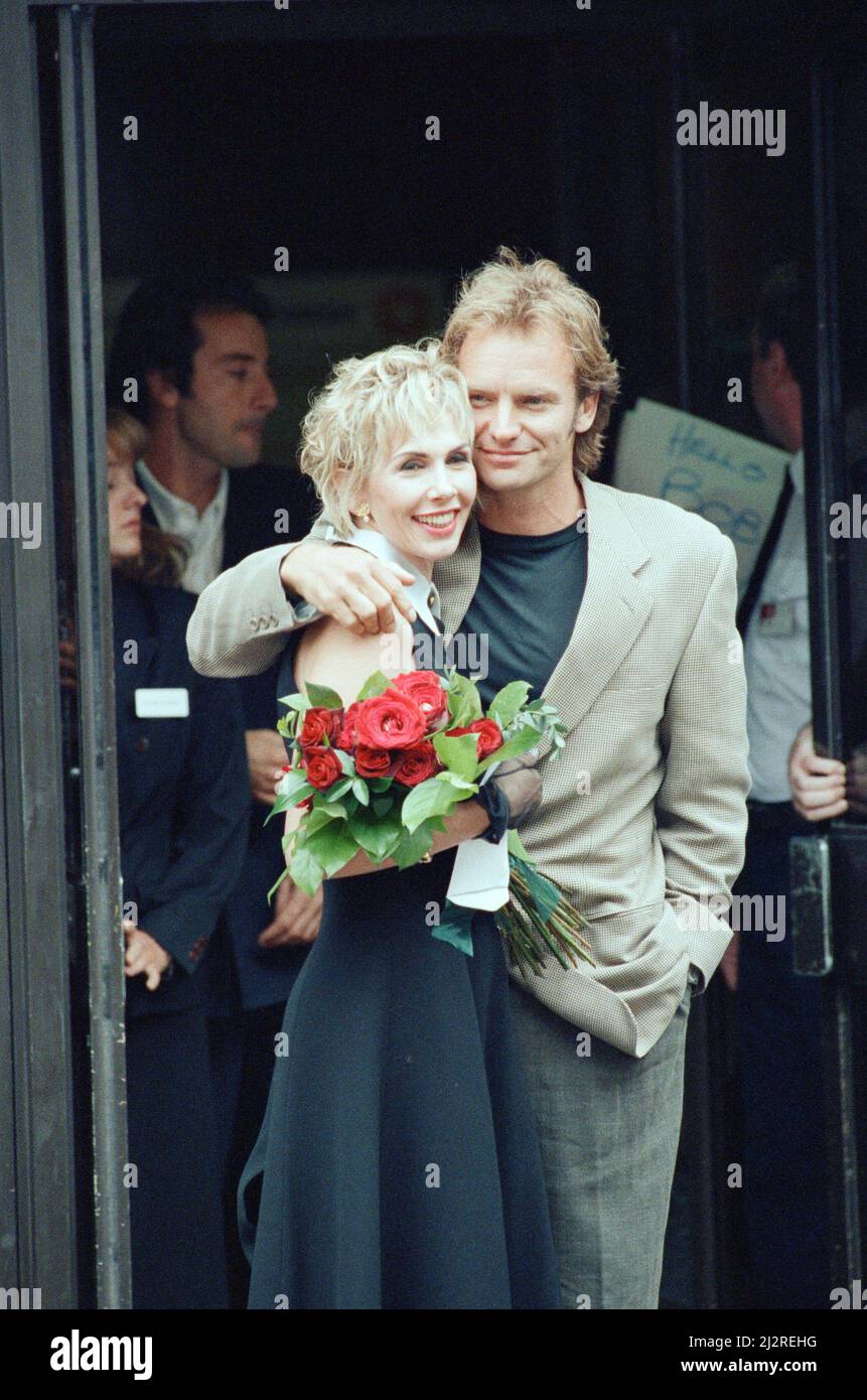 Sting holds and his bride Trudie Styler outside Camden register office ...