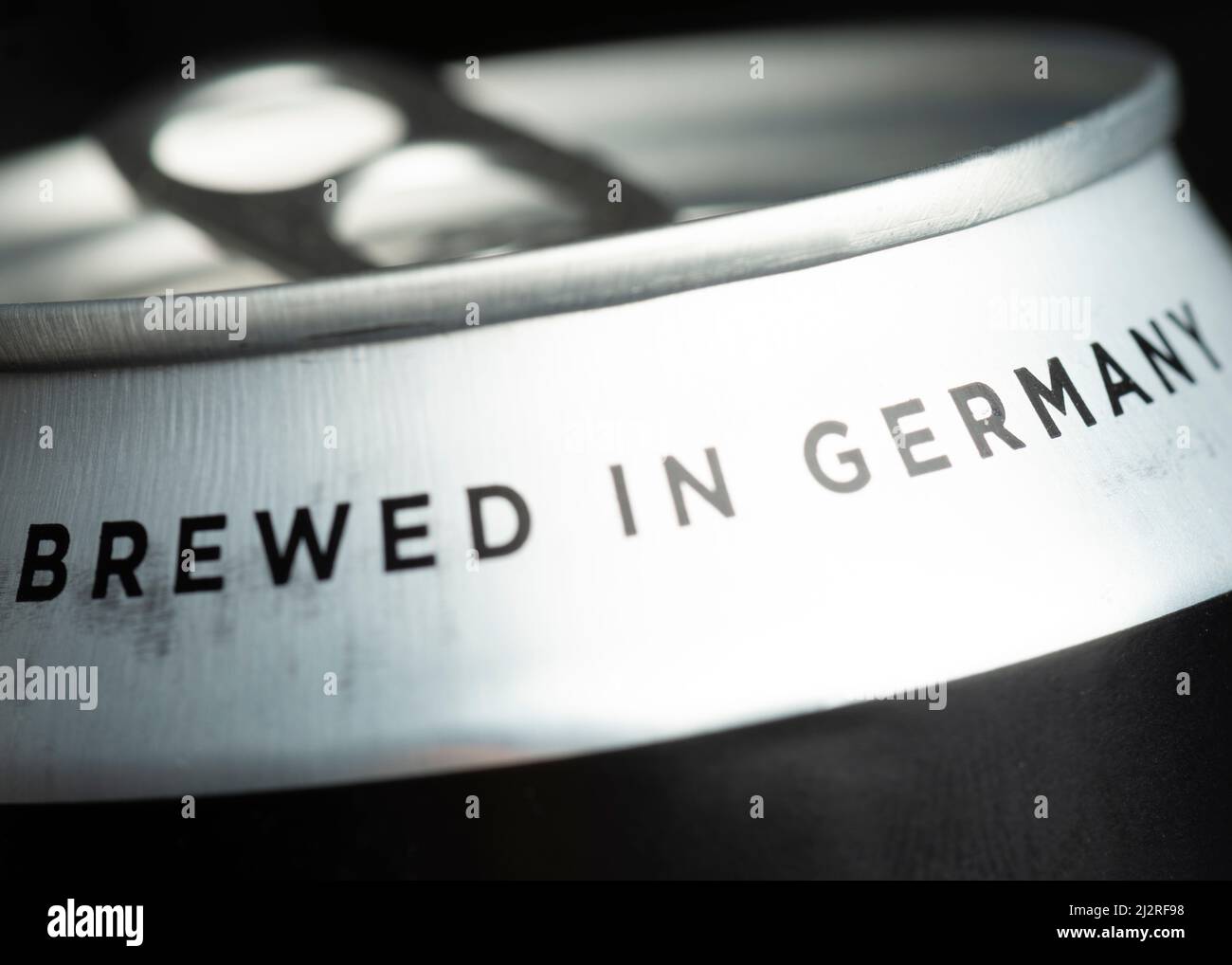 German beer brewed in Germany beer can close up detail on black Stock ...