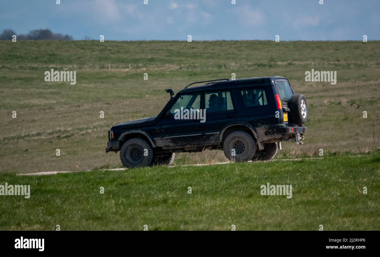 land rover 4x4 off road vehicle driving along a stone track Stock Photo ...