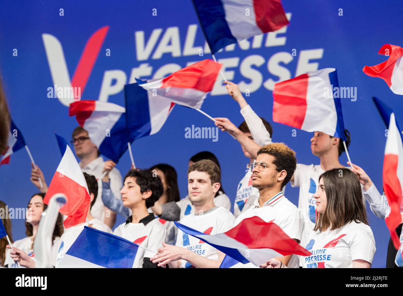 Activists waves French flag during Valerie Pecresse's meeting for the ...