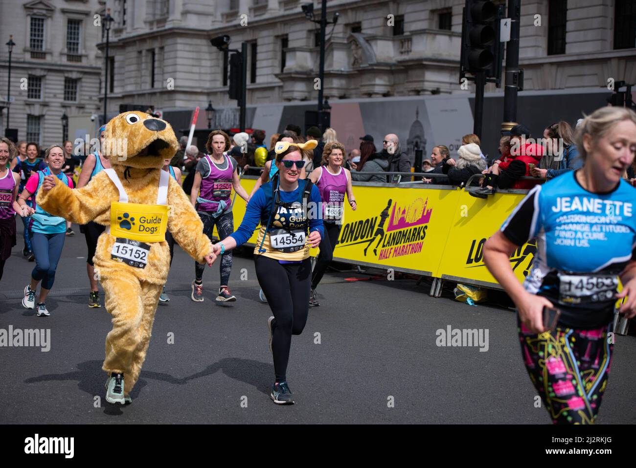 London, UK. 03rd Apr, 2022. A participant dressed as a Guide Dog takes ...