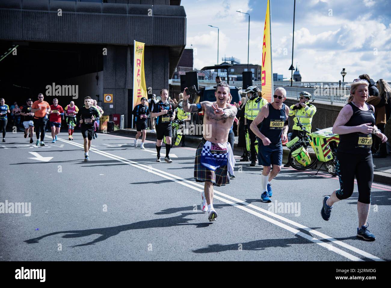 Participants take part in the London Landmarks Half Marathon through ...