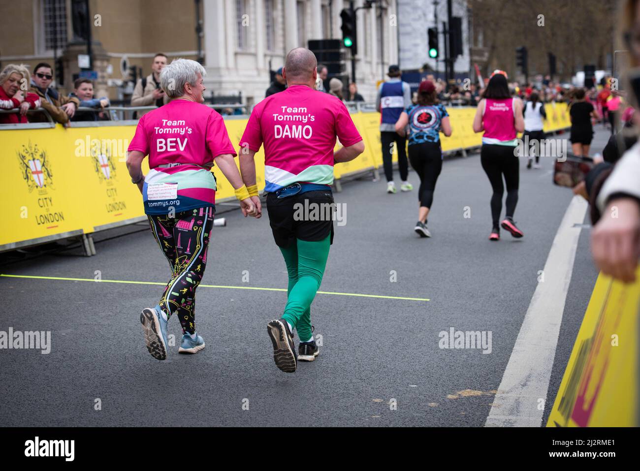 Participants take part in the London Landmarks Half Marathon through ...