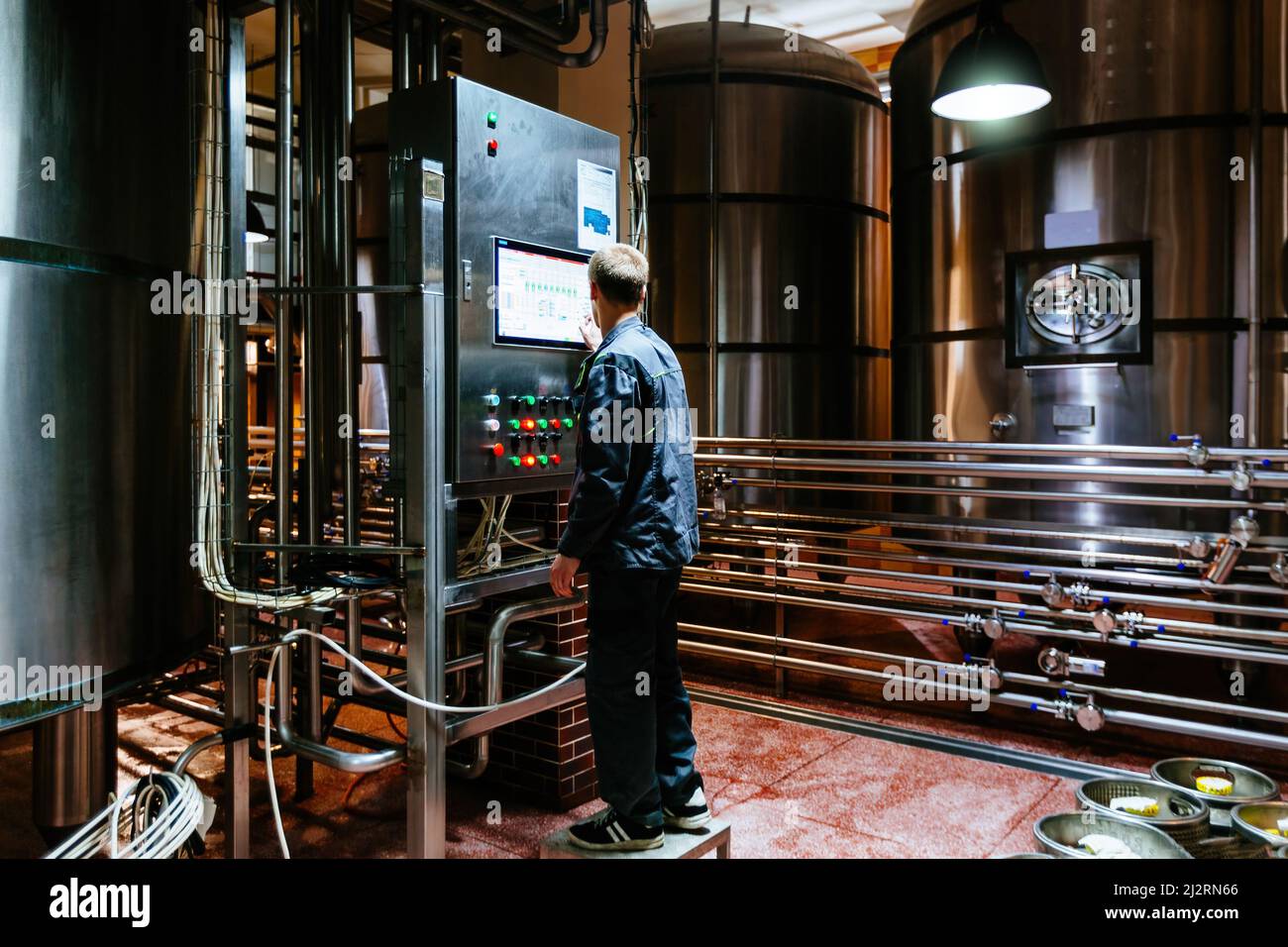 Brewer with CNC machine for control of brewing process Stock Photo - Alamy