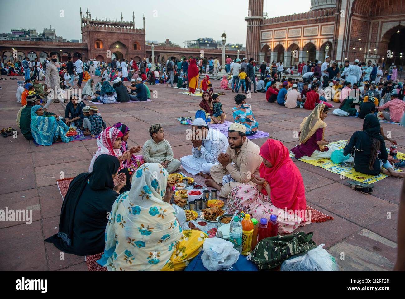 New Delhi, India. 03rd Apr, 2022. Muslim devotees pray before breaking ...