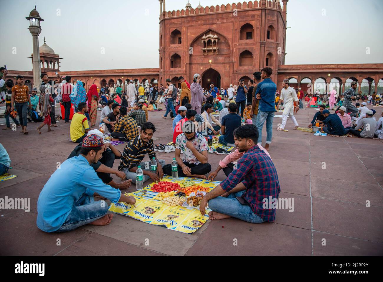 New Delhi, India. 03rd Apr, 2022. Muslim devotees break their fast at ...
