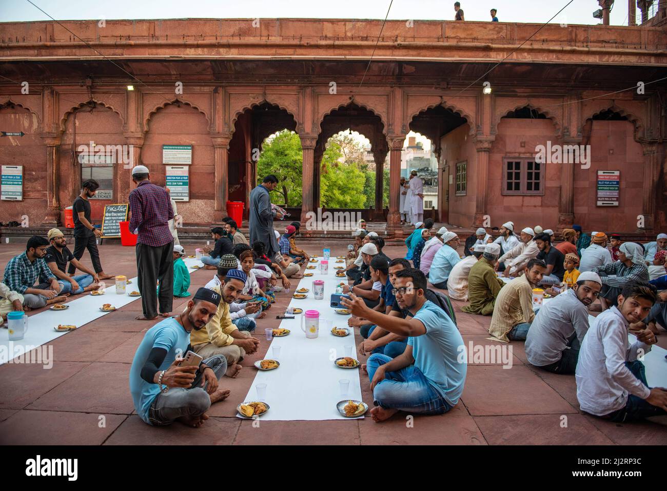 New Delhi, India. 03rd Apr, 2022. Muslim devotees take selfies before ...