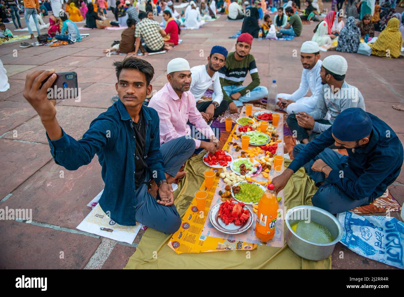 New Delhi, India. 3rd Apr, 2022. Muslim devotees take selfies before ...