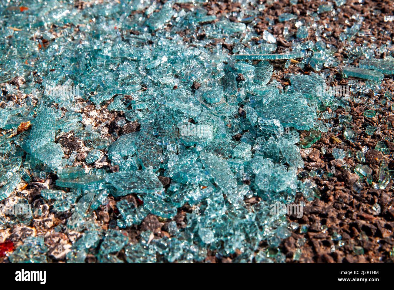 broken glass from cars, which was left after a road accident, broken ...