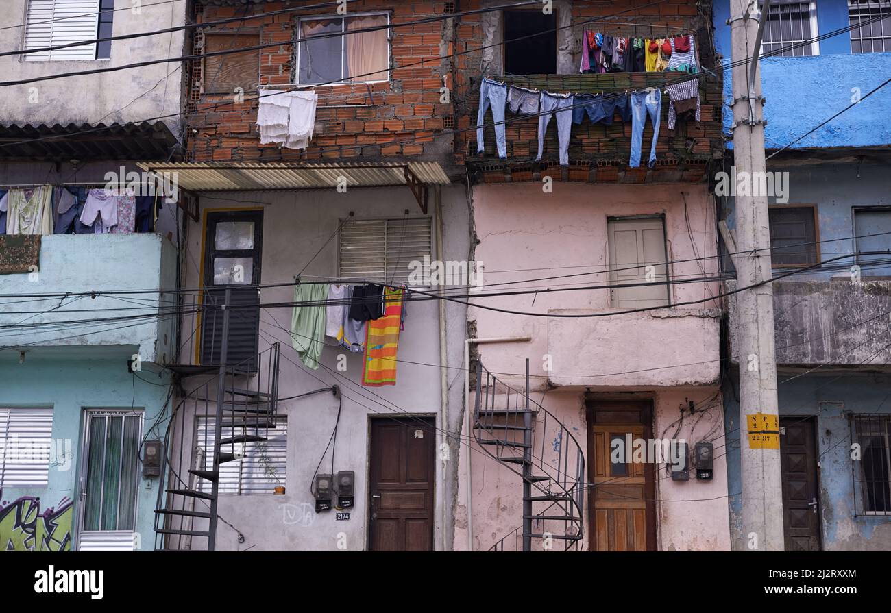Impoverished settlement. Facade of a run-down apartment block Stock ...