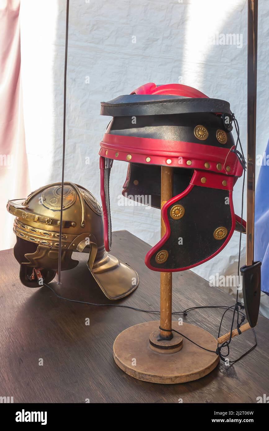 vertical view of two ancient helmets of roman soldier Stock Photo - Alamy