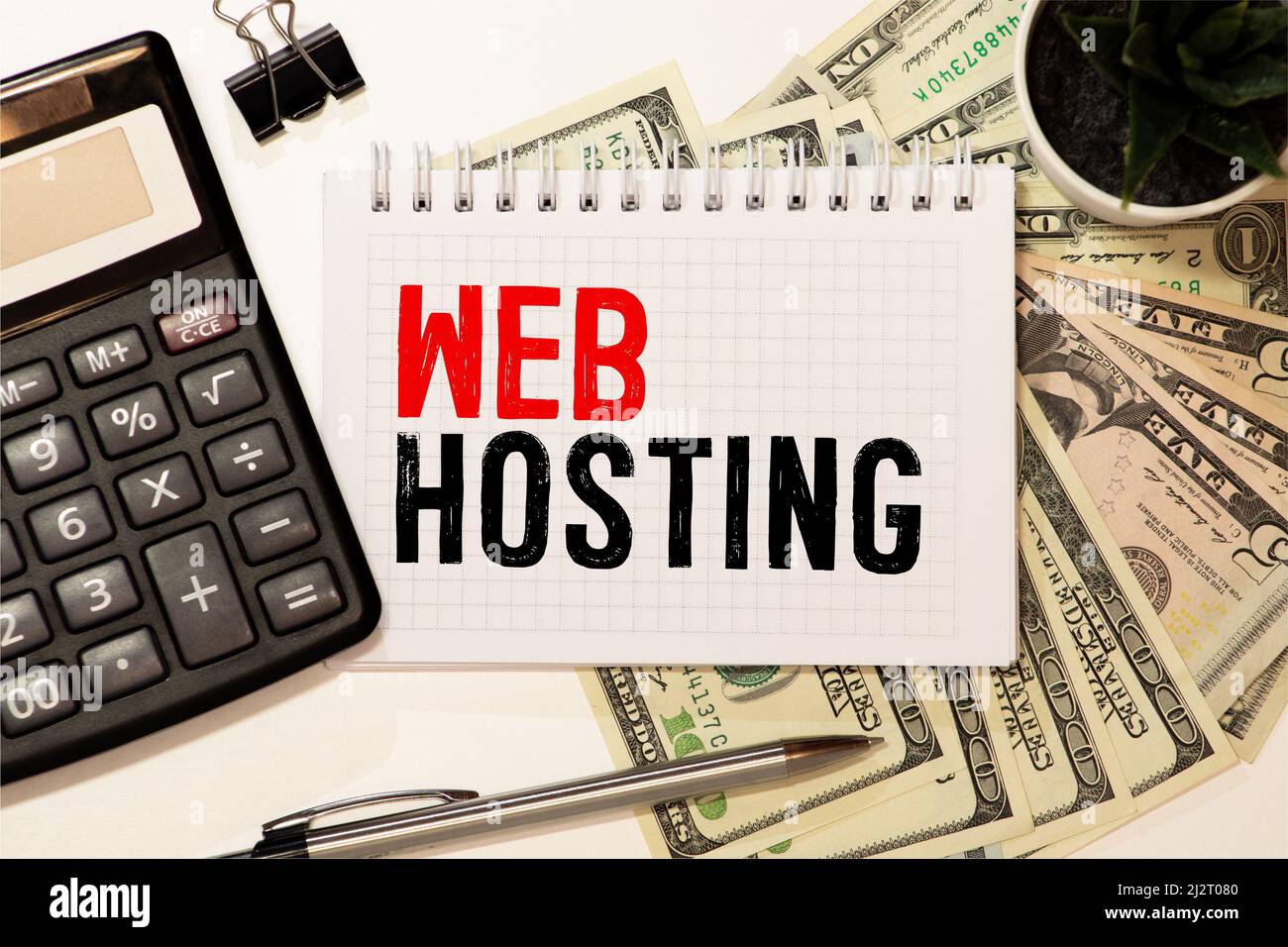 Business woman hands holding white card sign with web hosting text ...